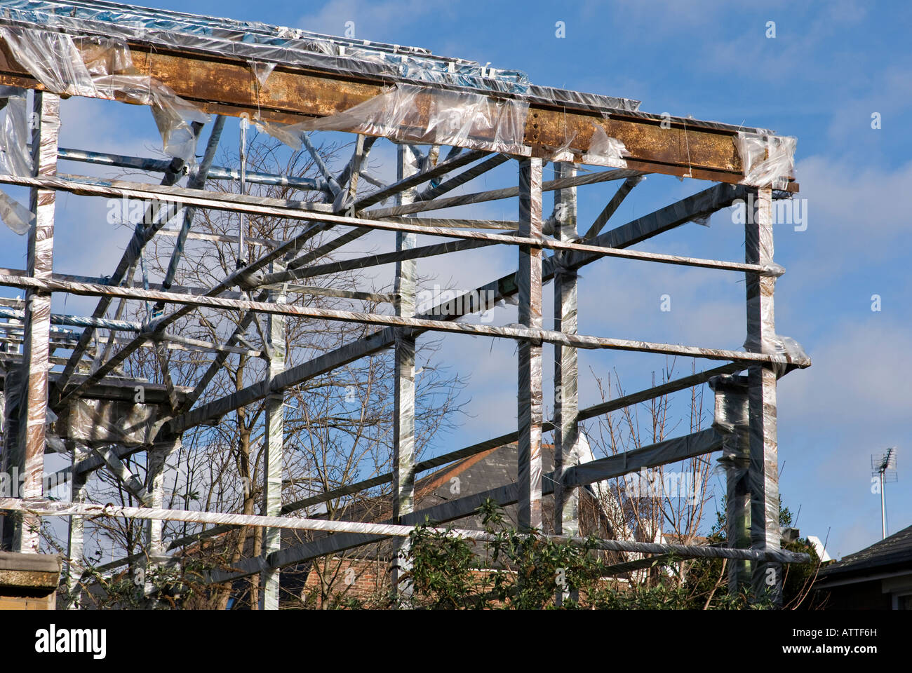 building wrapped in plastic Stock Photo - Alamy