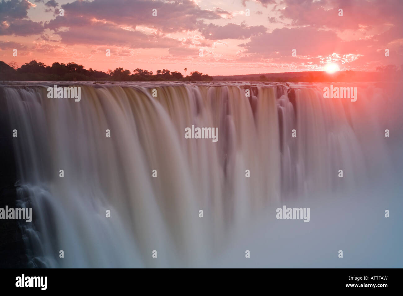 Evocative sunrise over Victoria Falls (Mosi-oa-Tunya), Zimbabwe Stock ...