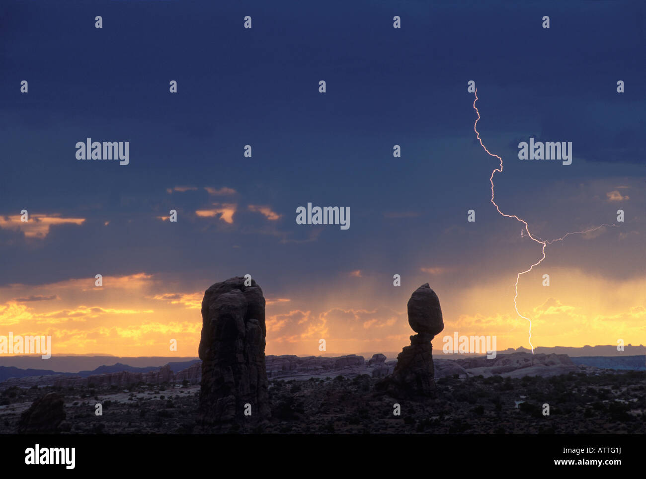 Lightning Strike at Sunset Behind Balanced Rock in Arches National Park ...
