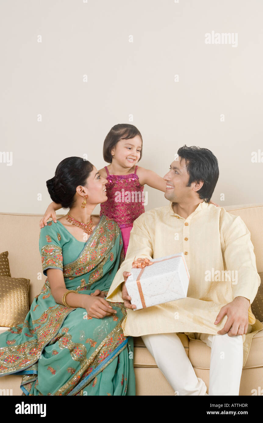 Girl smiling with her parents Stock Photo - Alamy