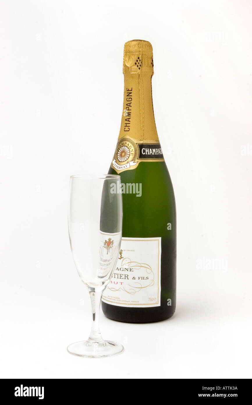 drink unopened bottle of champagne with one flute glass Stock Photo - Alamy