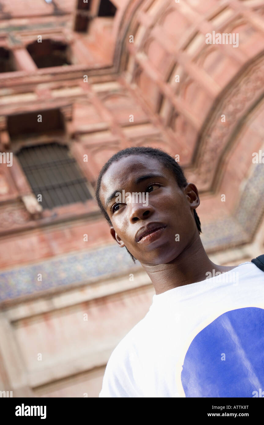 Low angle view of a young man looking away, Taj Mahal, Agra, Uttar ...