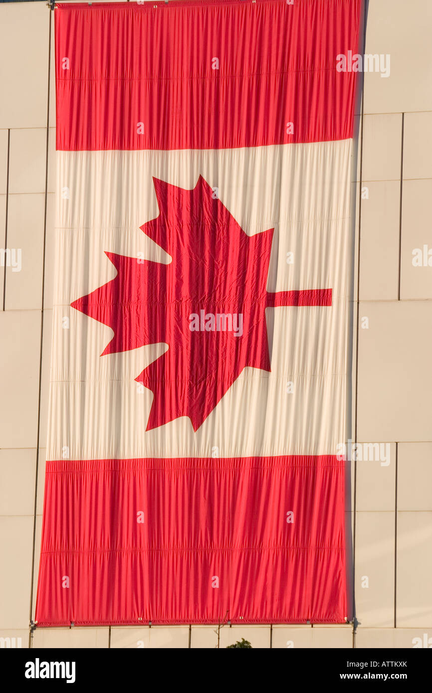 The Canadian flag at the side of a building Stock Photo - Alamy
