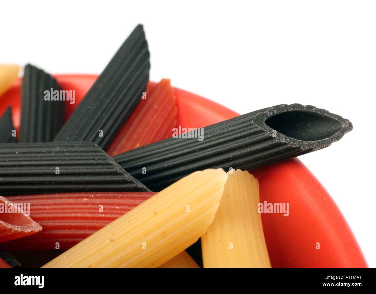 Clolor pasta detail isolated on white background Stock Photo - Alamy