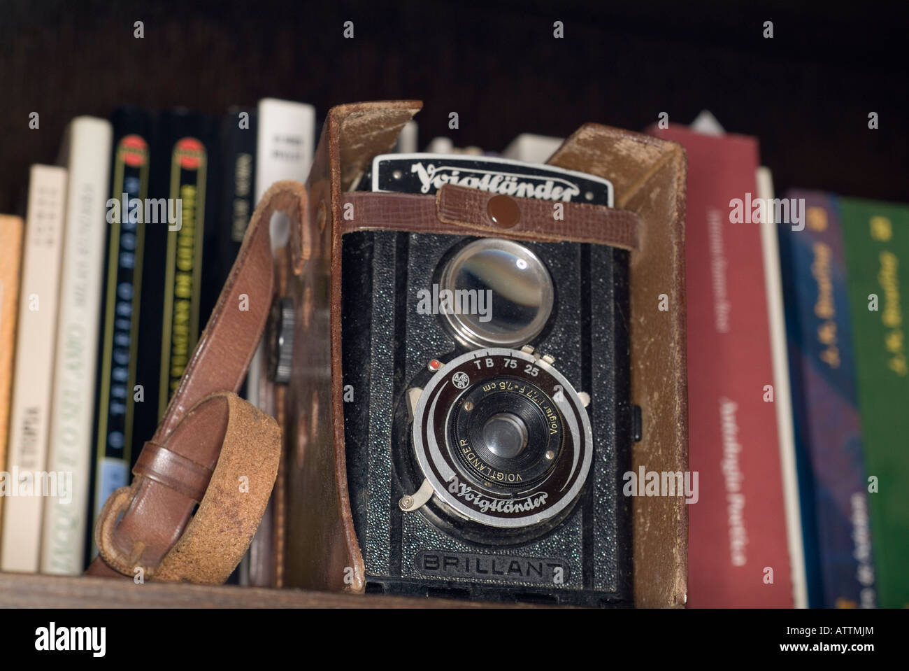 old Voigtlander camera on a bookshelf Stock Photo - Alamy