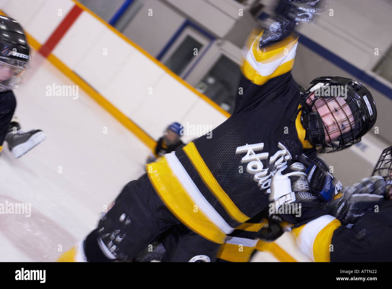 Boy celebrating hockey goal Stock Photo - Alamy