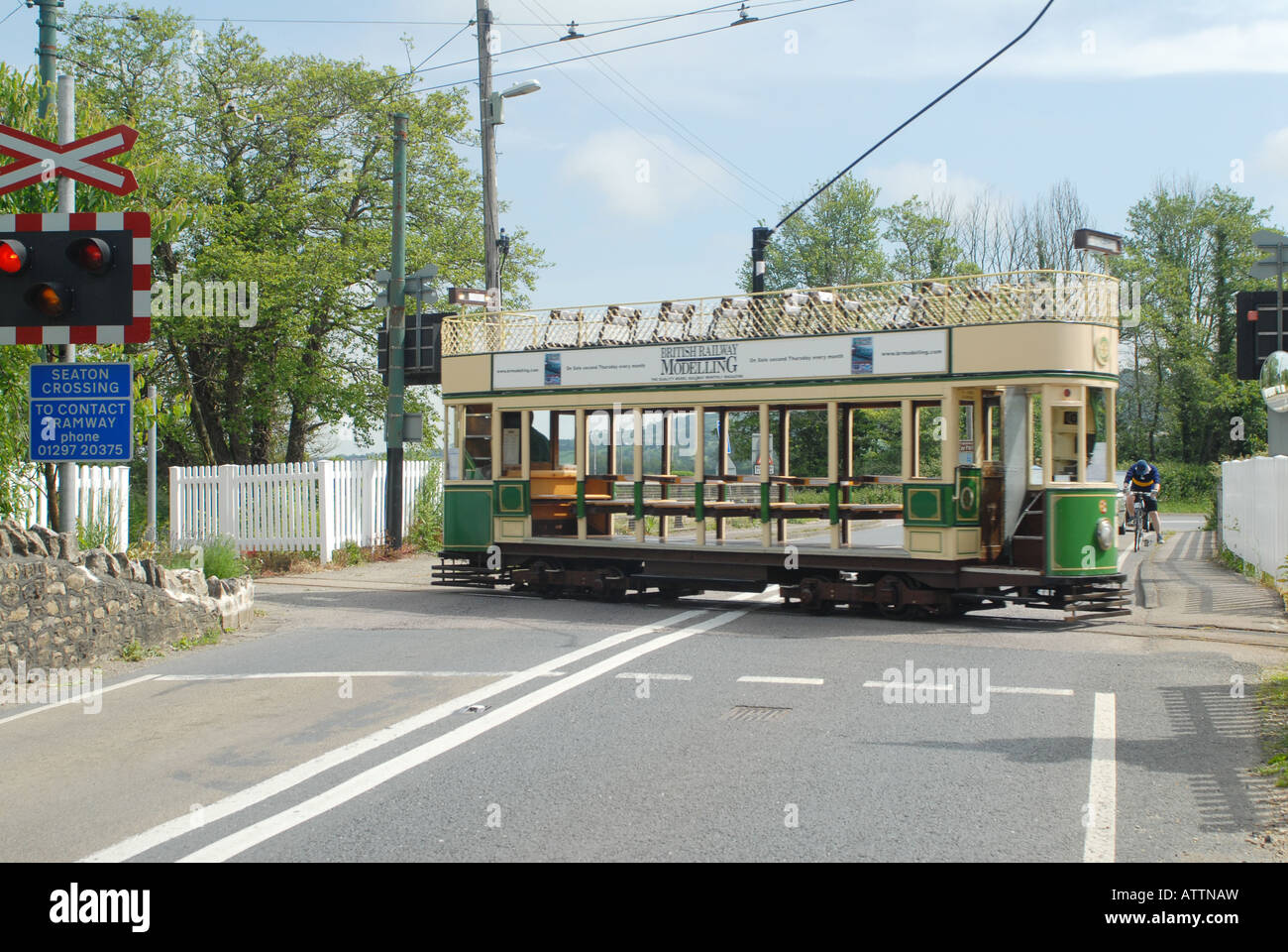 Tram crossing road Stock Photo - Alamy