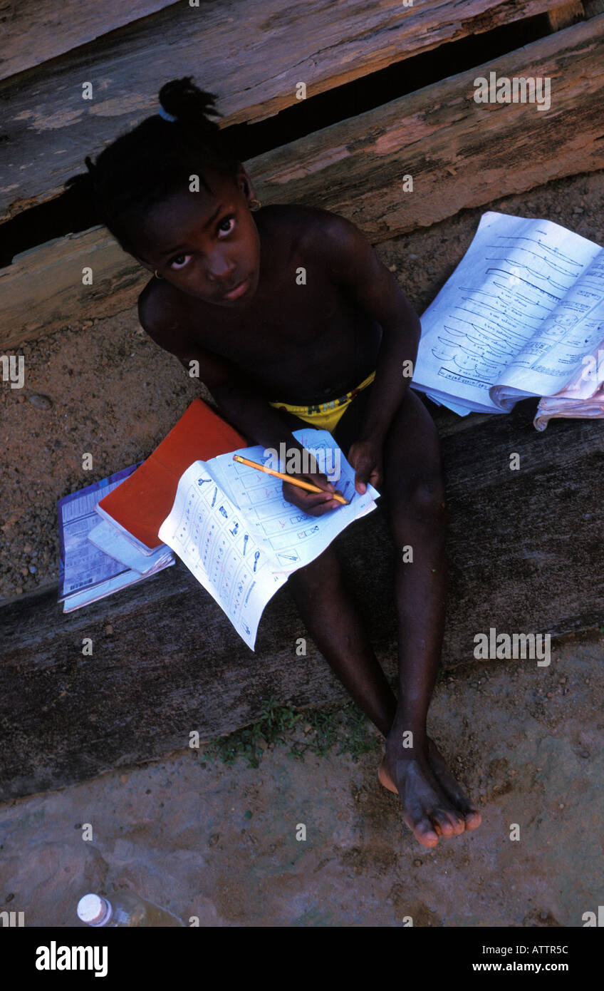 Kumalu a Saramaccan girl with school books Stock Photo - Alamy