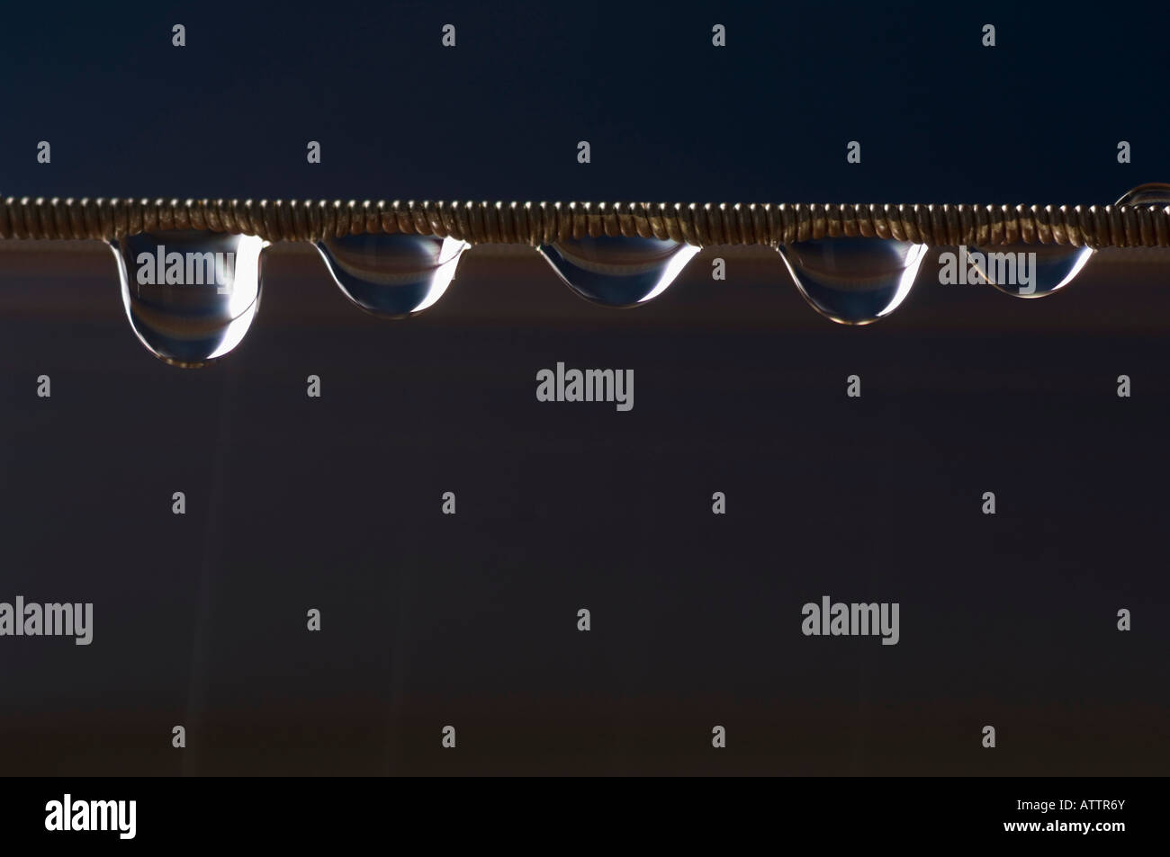 Drops of water on a black metal hi-res stock photography and images - Alamy