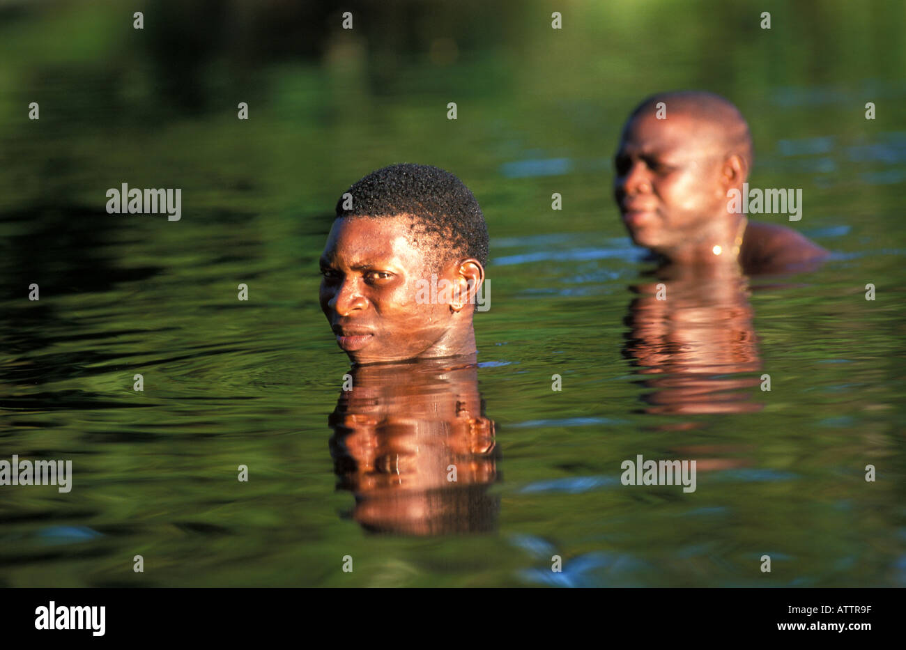 Kumalu Saramaccan swimming in the Pikin Rio river Stock Photo - Alamy