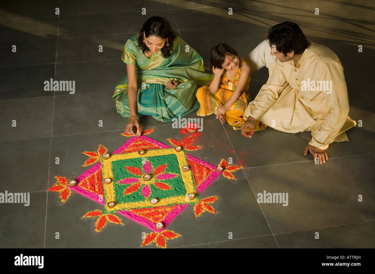 Indian girls making rangoli hi-res stock photography and images - Alamy