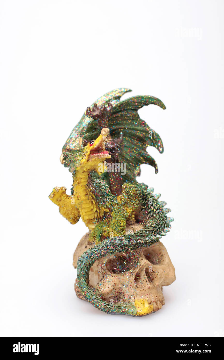 Decorative ceramic model of a fierce dragon on a skull Stock Photo - Alamy