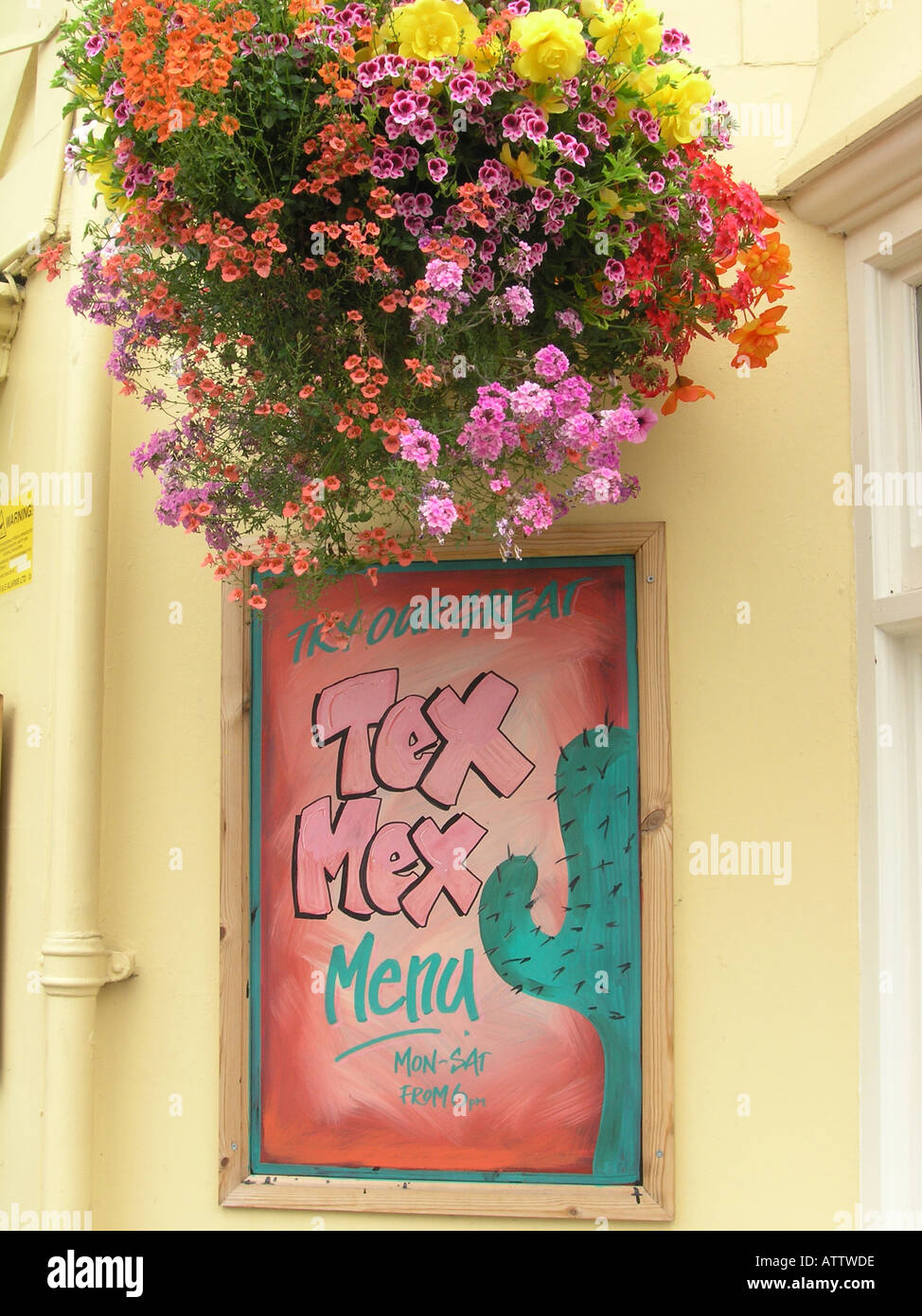 pub sign advertising mexican food Stock Photo - Alamy