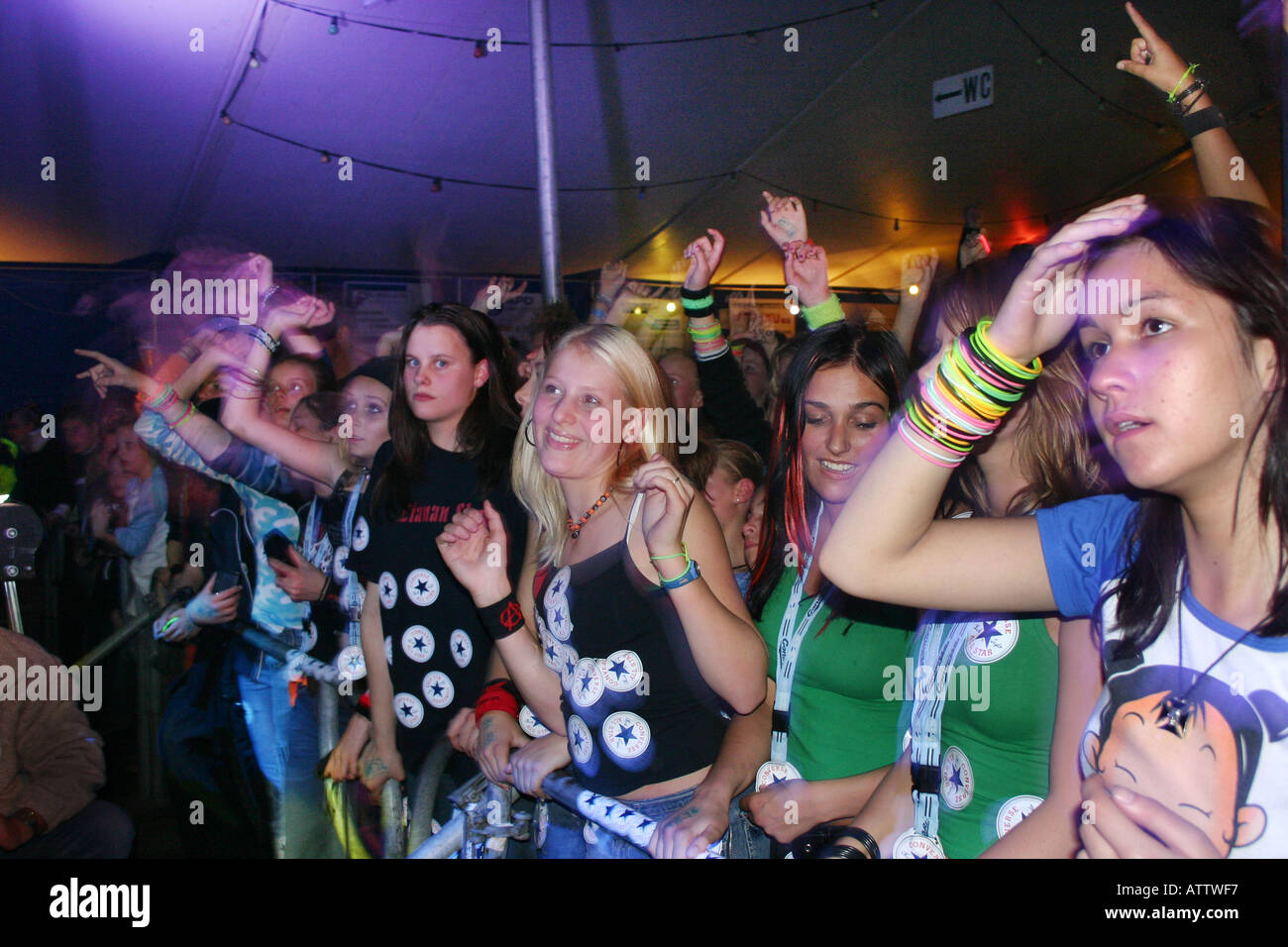 enthusiastic teenagers at rock concert Stock Photo - Alamy