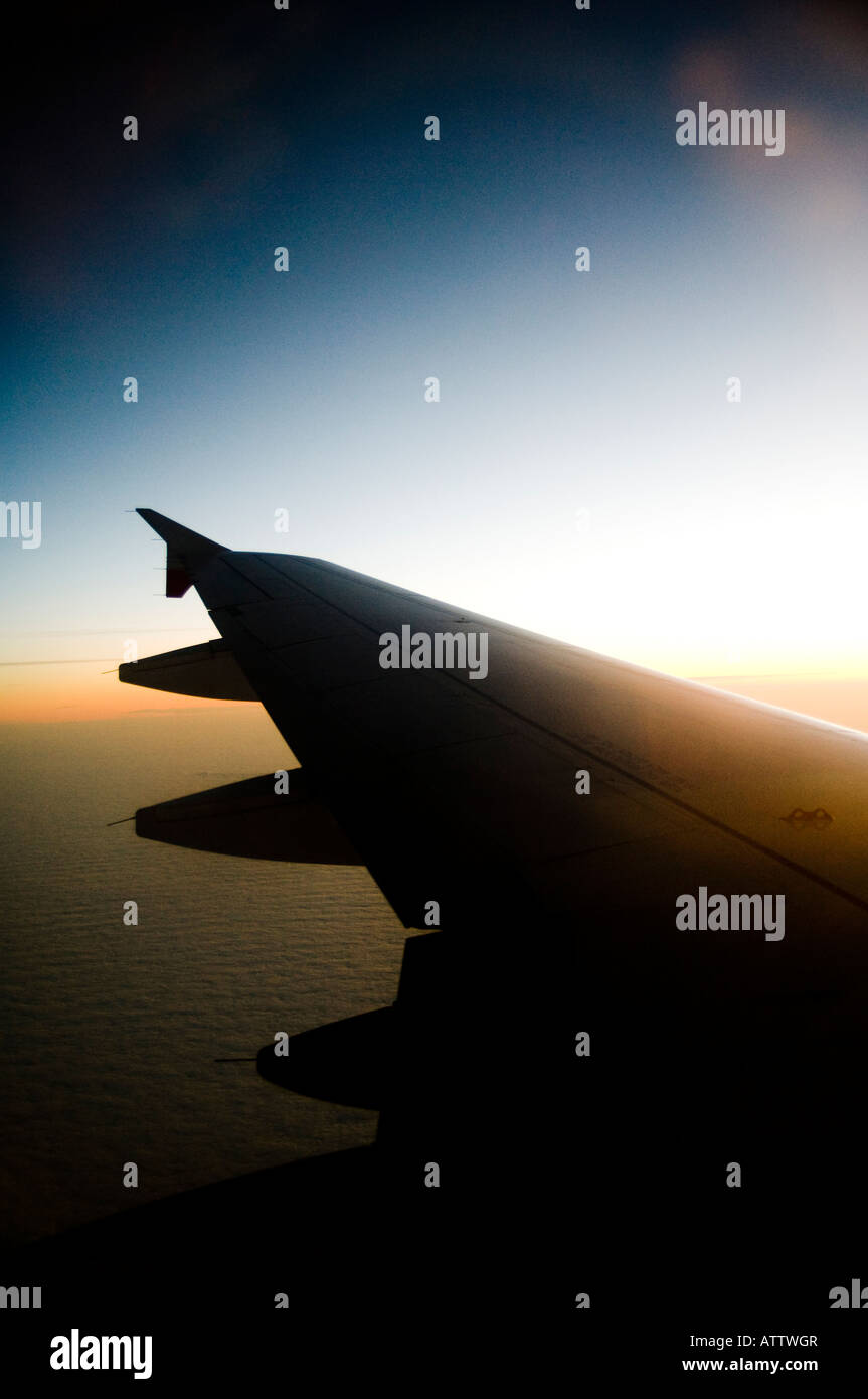 View of aeroplane wing through window Stock Photo - Alamy
