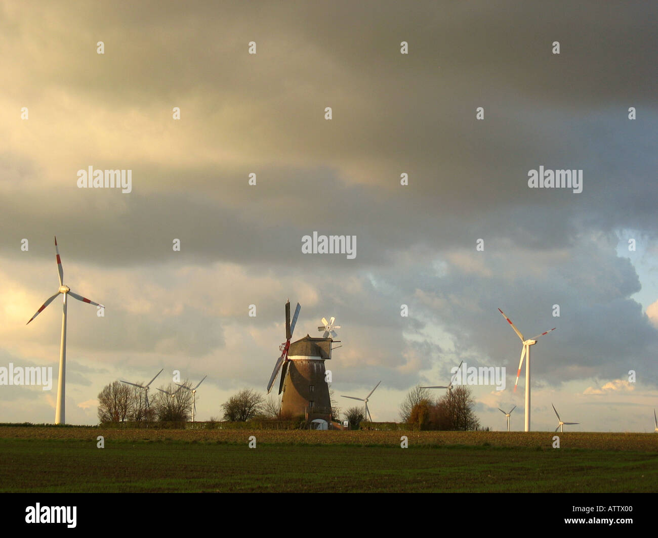 traditional windmill and modern wind turbines germany Stock Photo - Alamy
