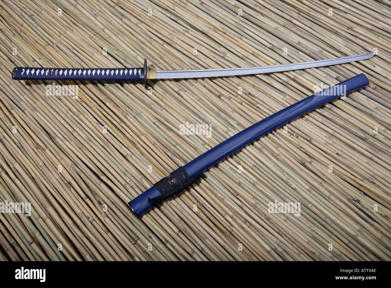 Samurai sword and sheath on bamboo canes Stock Photo - Alamy