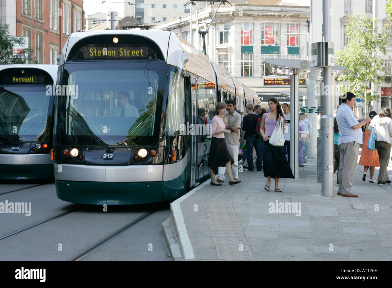 NET Nottingham express transit tram disembarking passengers at tram ...