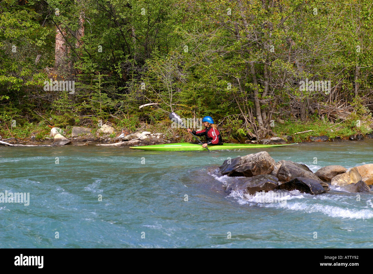 Kayaks on a dangerous river Stock Photo - Alamy
