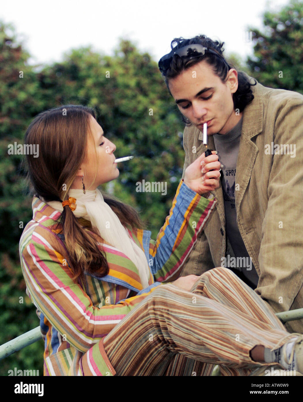 Hippies smoking cigarette hi-res stock photography and images - Alamy