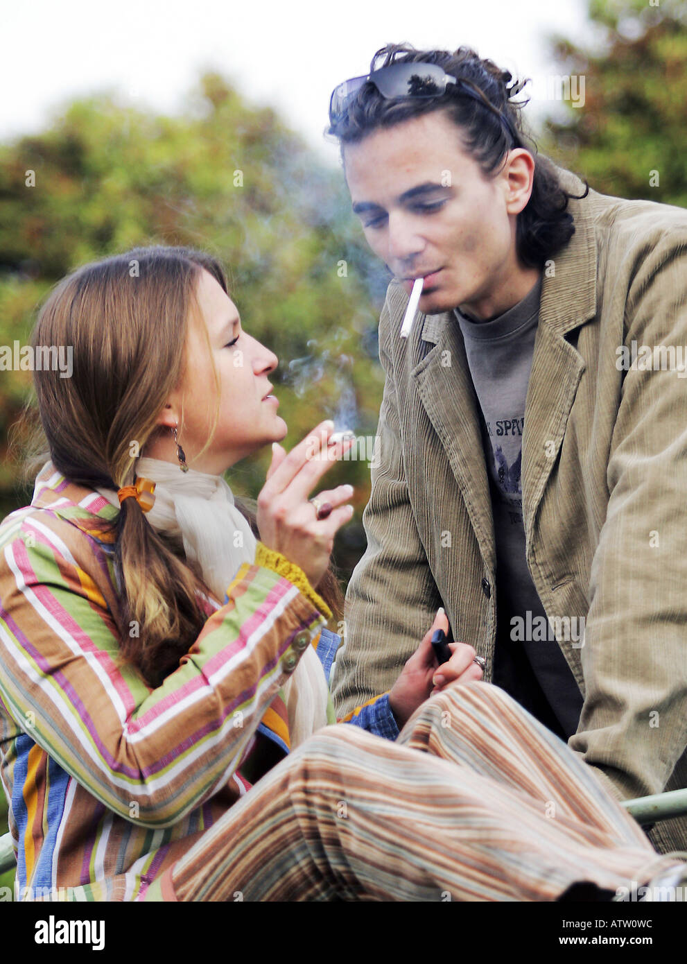 Hippies smoking cigarette hi-res stock photography and images - Alamy