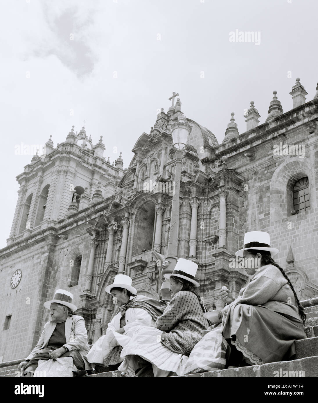 Peruvian Aymara Quechua peasant women at the cathedral in Plaza de ...