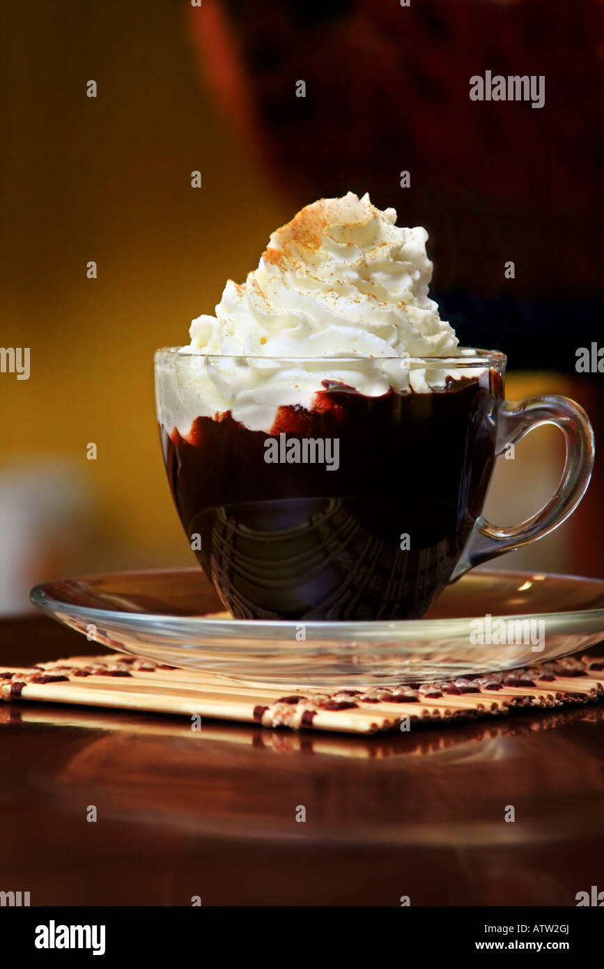 Hot chocolate with whipping cream in cafe Stock Photo - Alamy