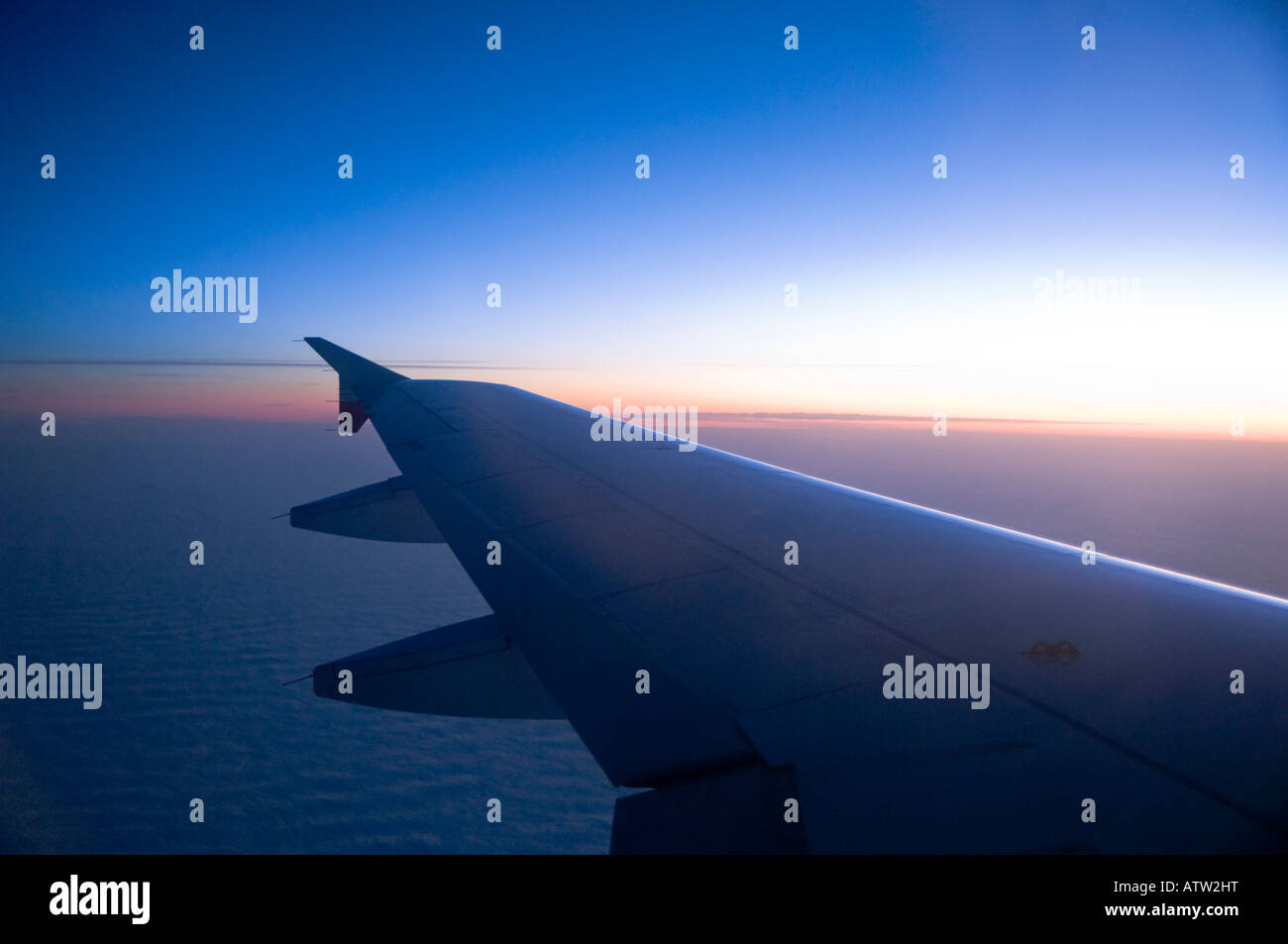 View of aeroplane wing through window Stock Photo - Alamy