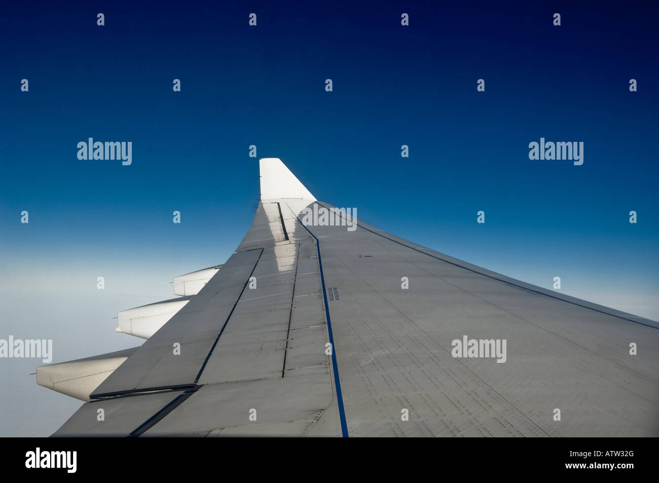 View of aeroplane wing through window Stock Photo - Alamy