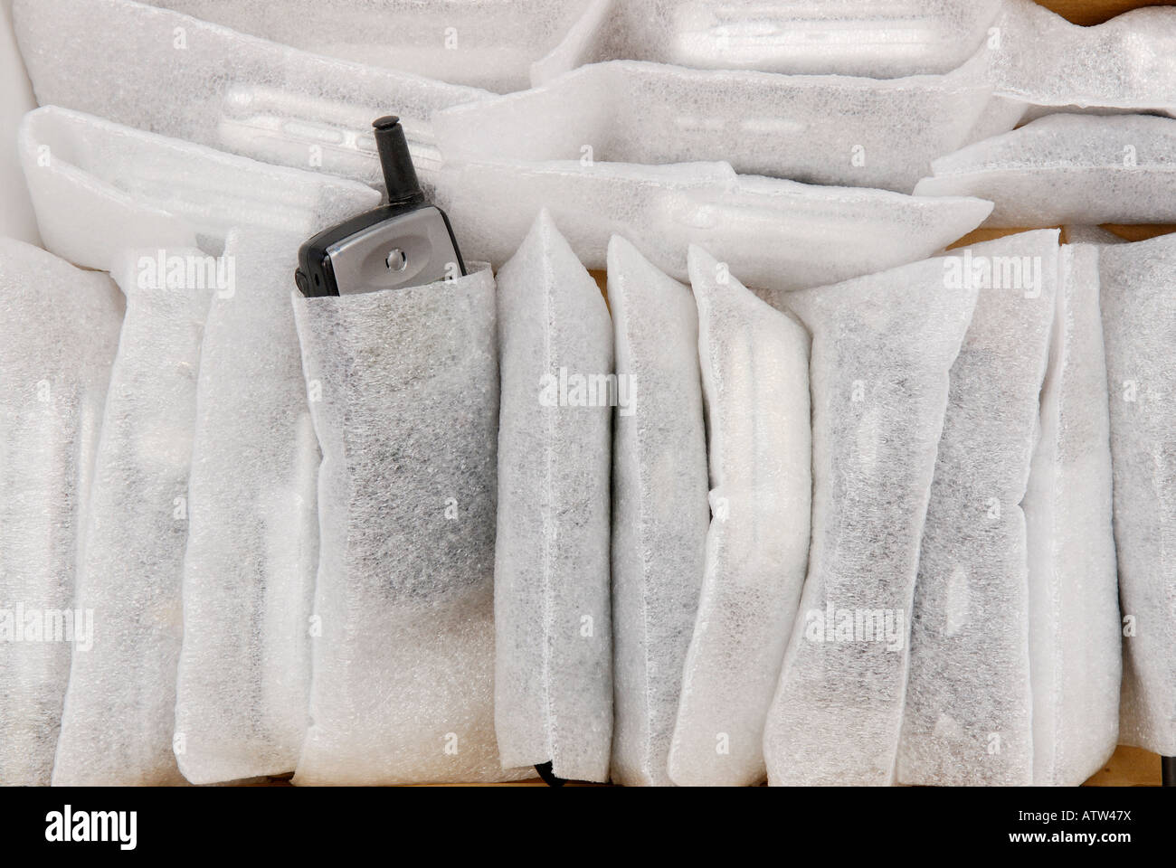 Used cell phones packaged to be shipped for recycling Stock Photo - Alamy