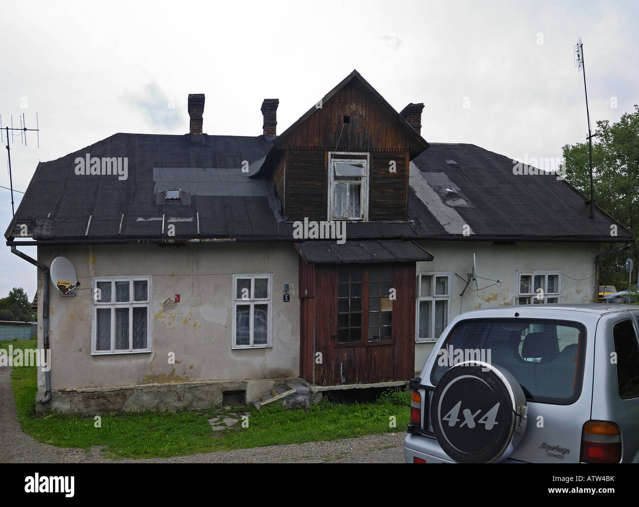 Old house and new car Stock Photo - Alamy