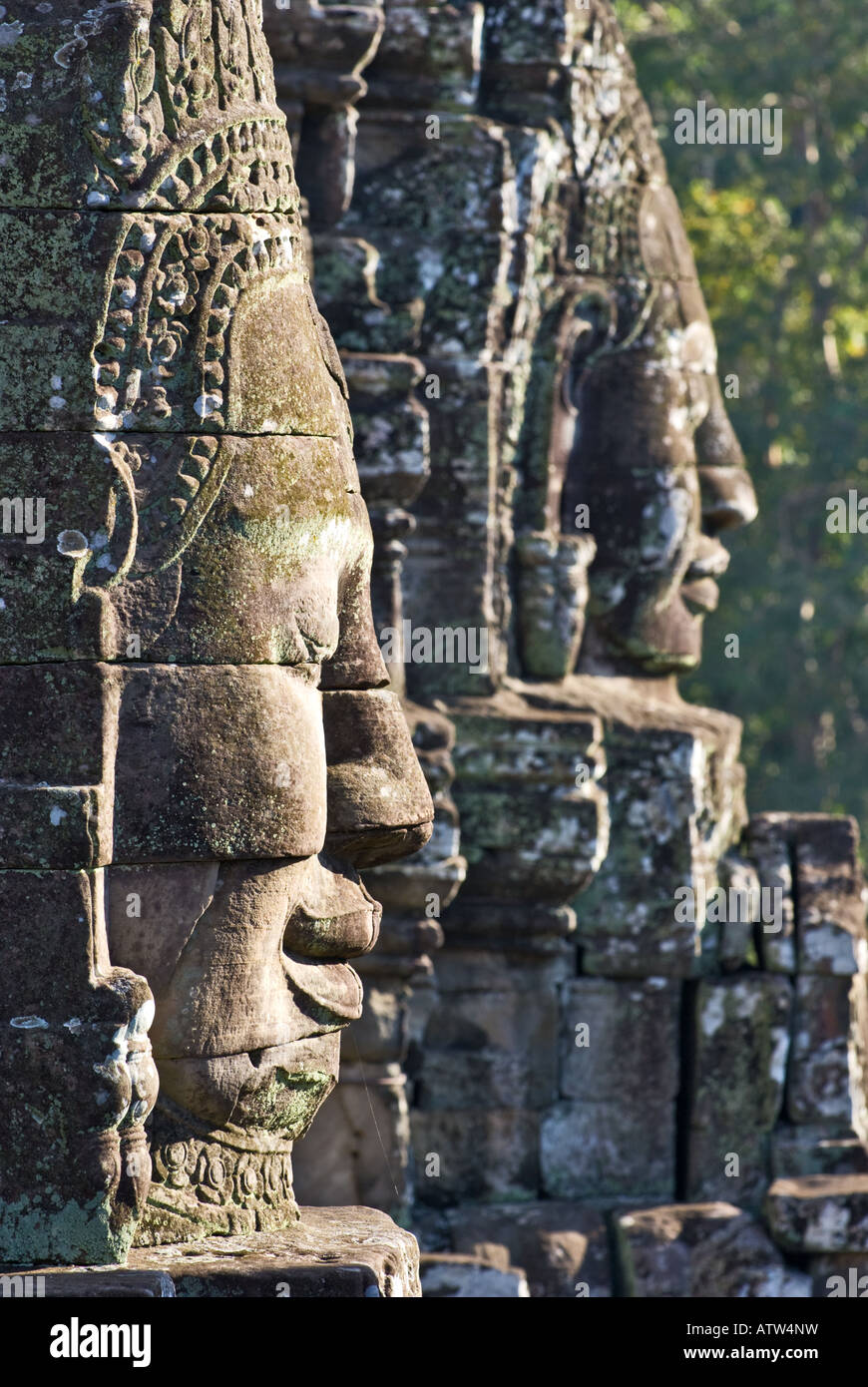 Bayon faces at sunset Cambodia Stock Photo - Alamy