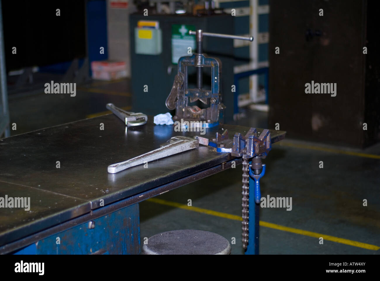 A Pipe Fitting Bench with a Pipe Vice and Stilsons Stock Photo - Alamy