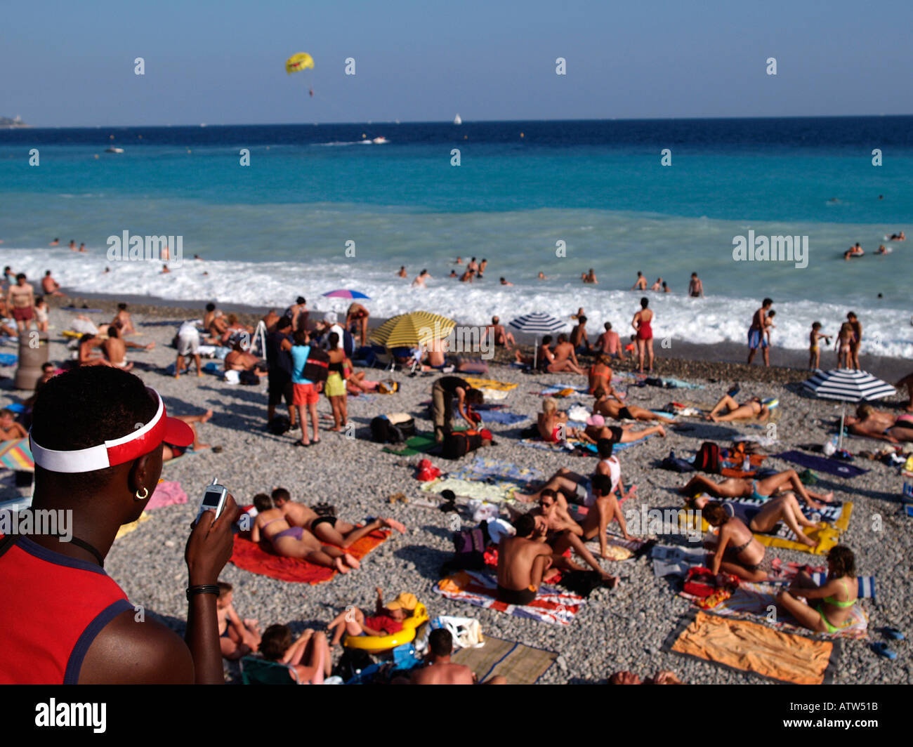 Waiting for a phone call at the beach Stock Photo - Alamy