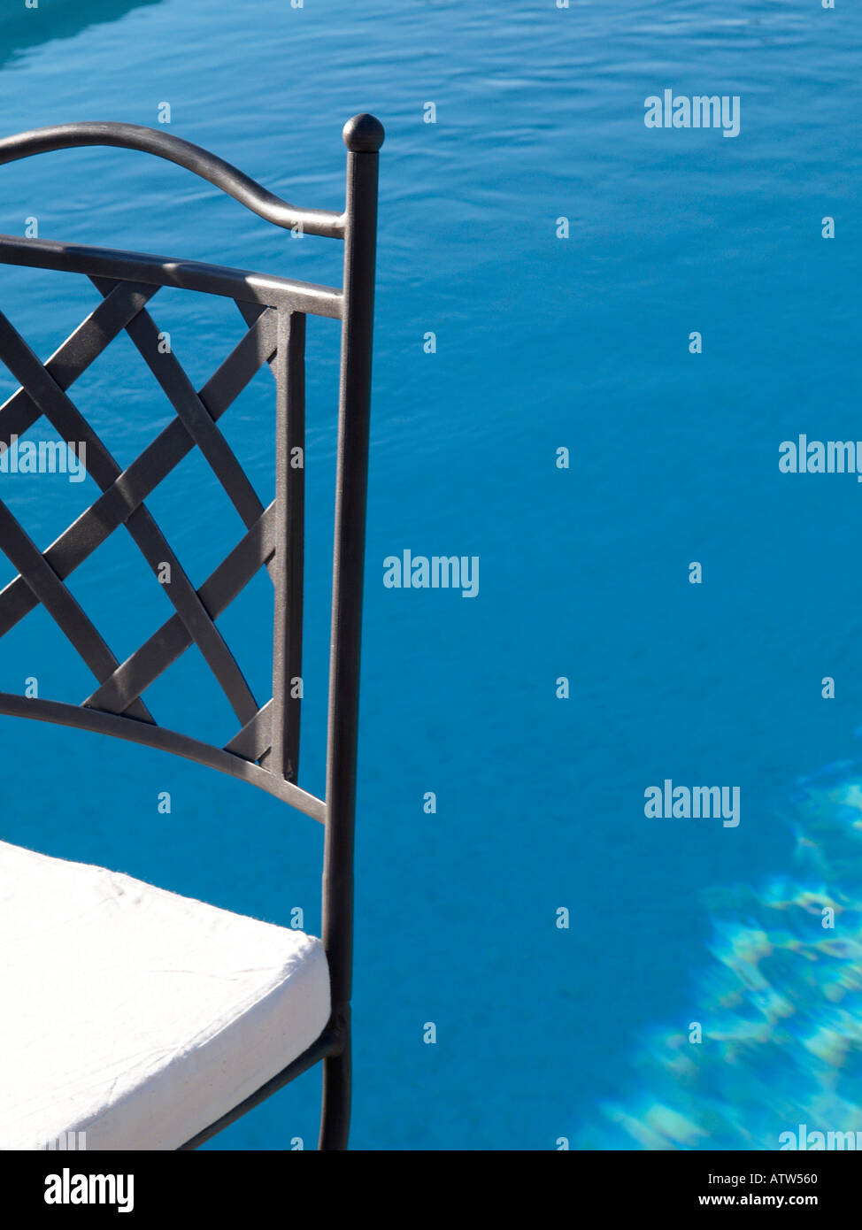 Chair near a swimming pool Stock Photo - Alamy
