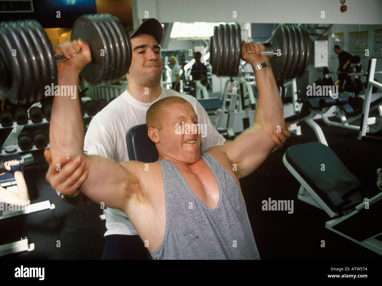 Man keeping fit in a Keep Fit Gym with personal trainer London England ...