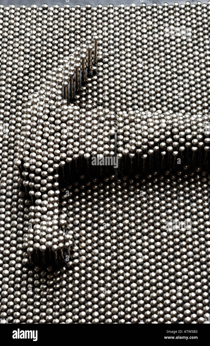 Pin Matrix with claw hammer imprint Stock Photo - Alamy