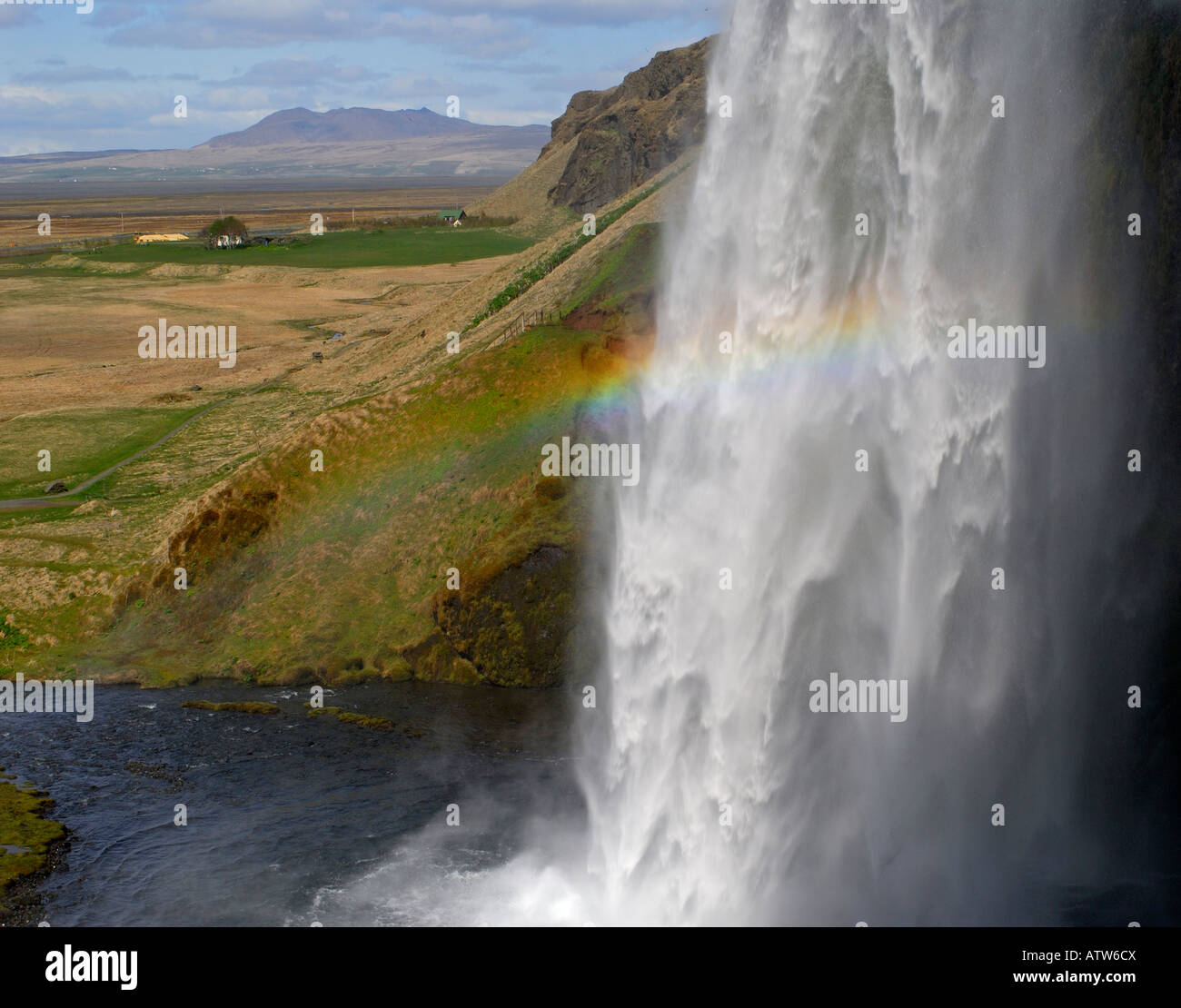 Landscape of Iceland Rainbow over Seljalandsfoss waterfall Iceland ...