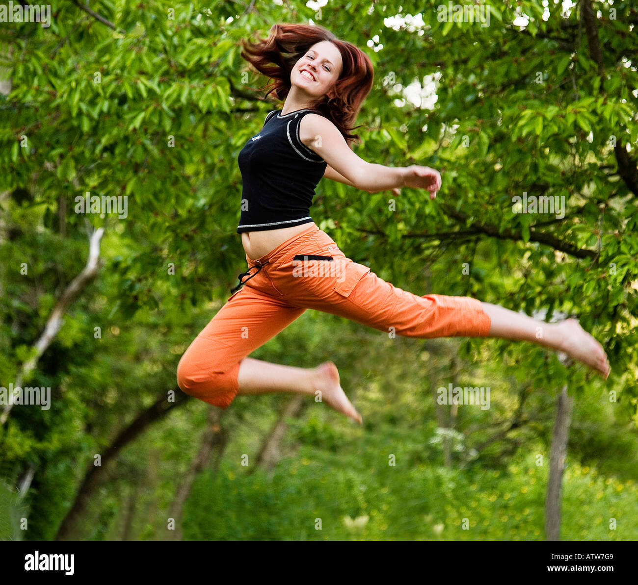 Woman gymnast leaping hi-res stock photography and images - Alamy