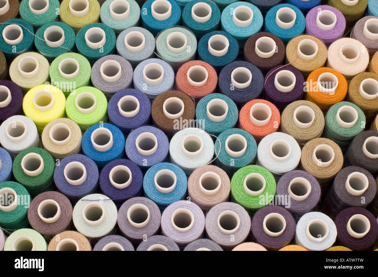 object on white spool of thread Stock Photo - Alamy