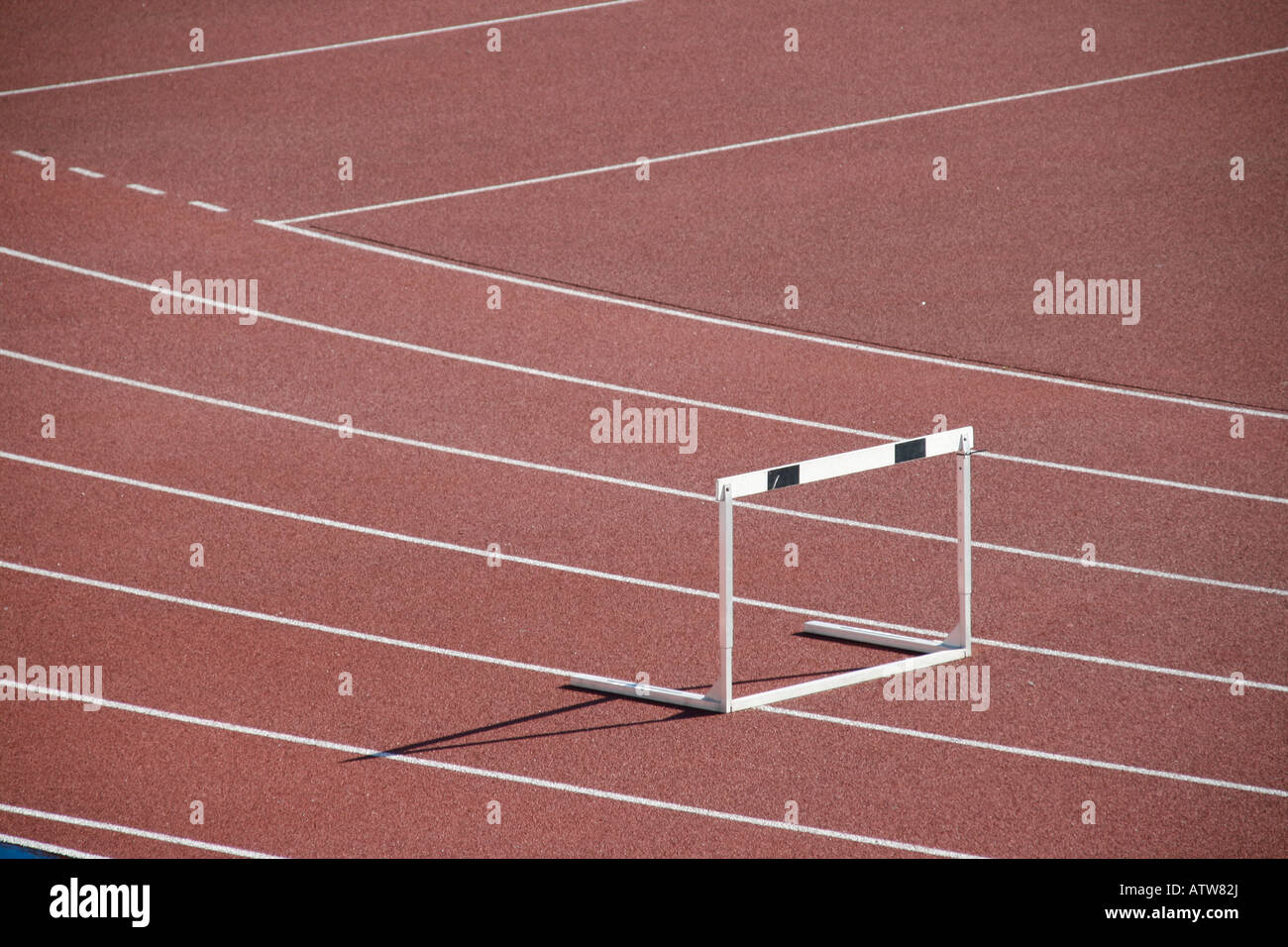 hurdle on athletic track Stock Photo - Alamy