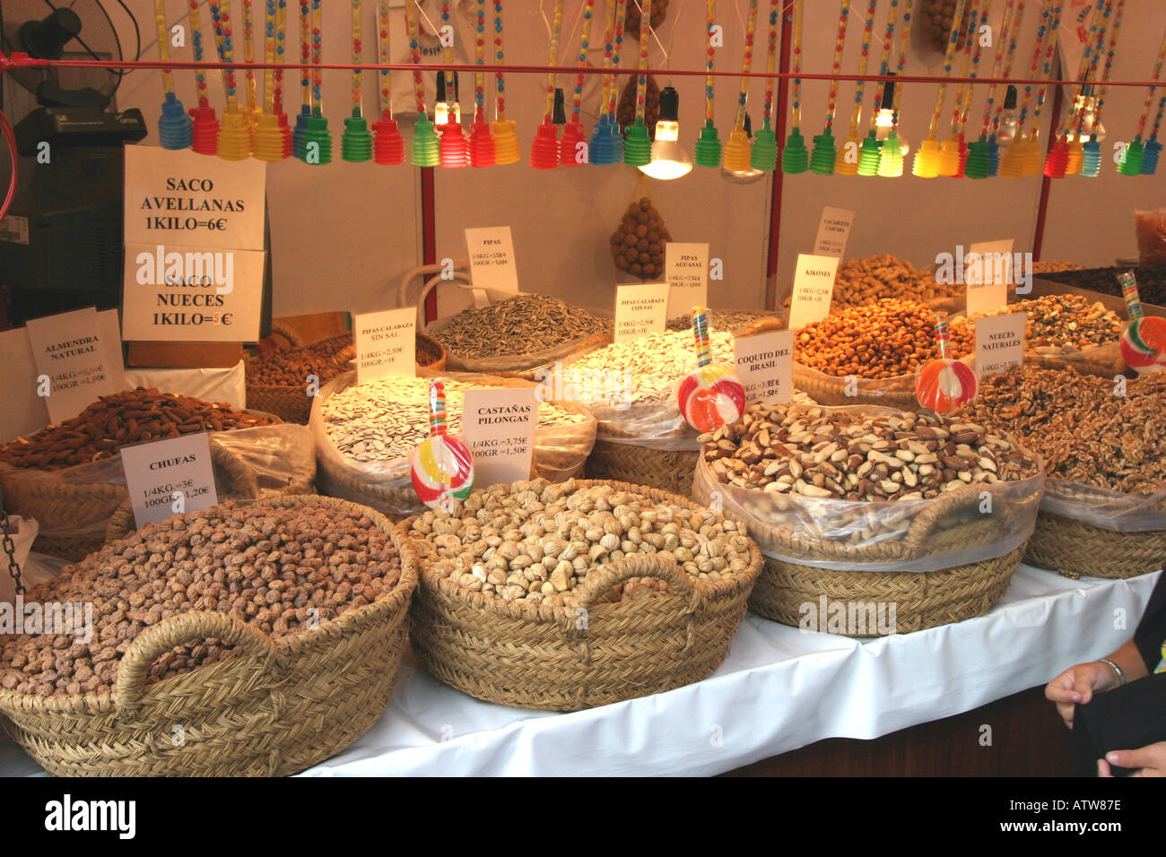 Market stall selling nuts Stock Photo - Alamy