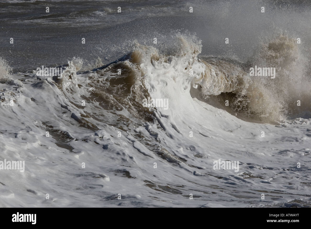 Waves at high tide North Norfolk Coast UK Stock Photo - Alamy