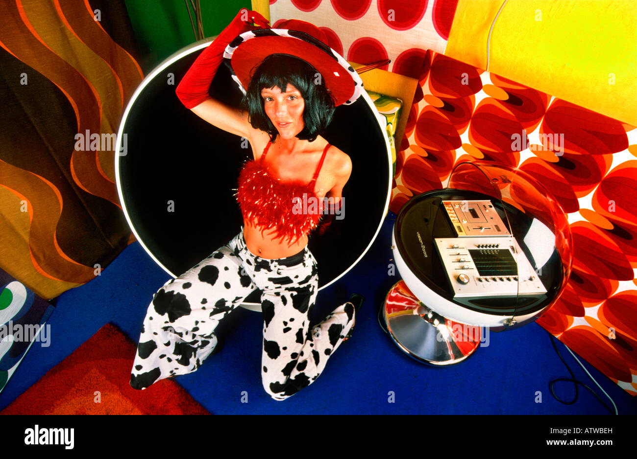 Woman sitting in ball chair hi-res stock photography and images - Alamy