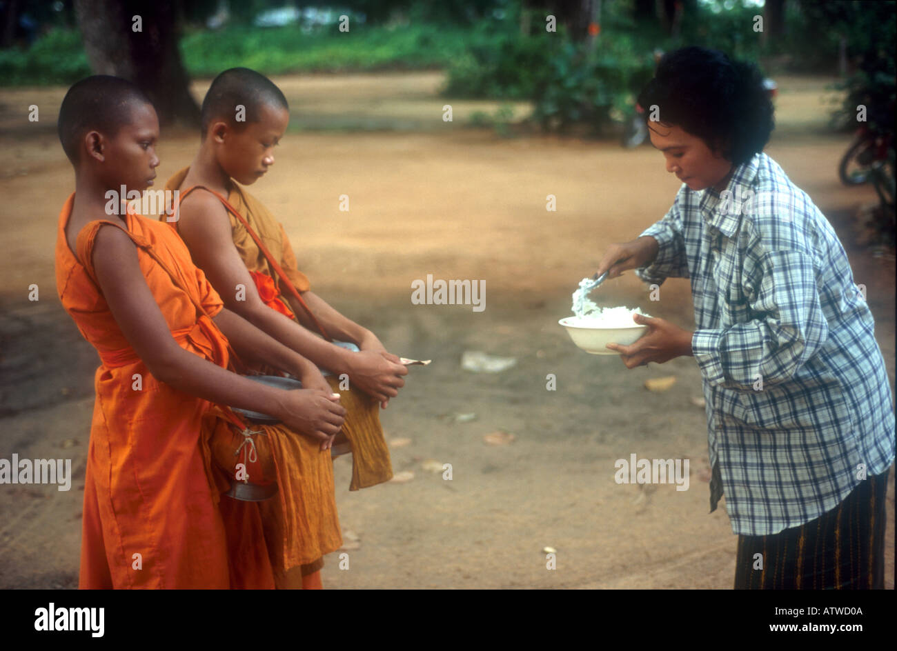 Buddhist monks early alms walk hi-res stock photography and images - Alamy