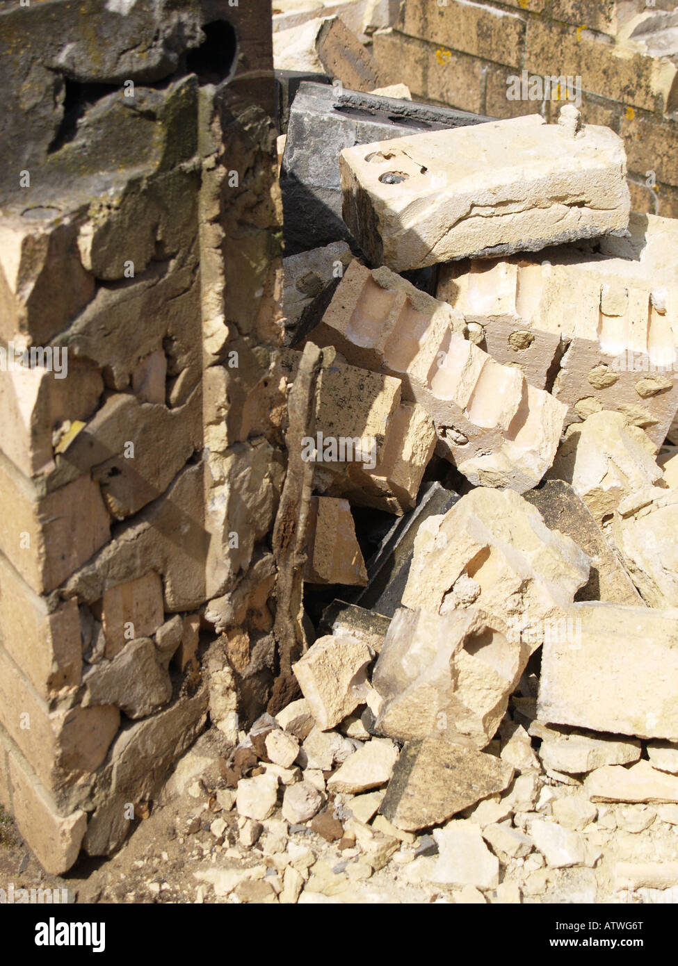broken brick wall hit by vehicle bricks broken Stock Photo - Alamy