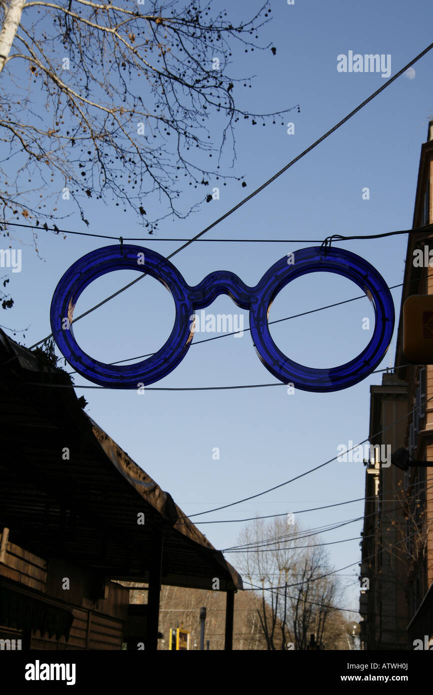 blue neon spectacles sign Stock Photo - Alamy