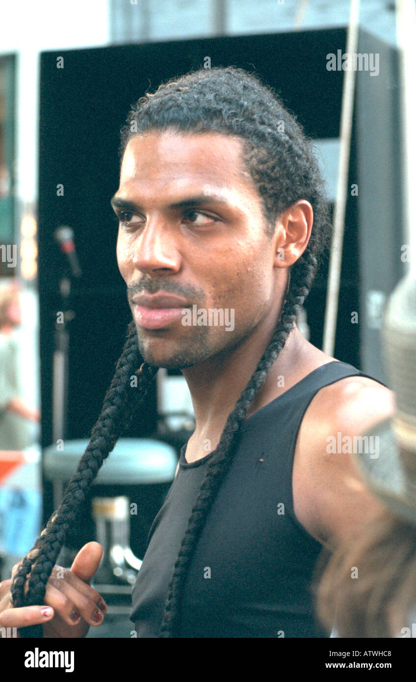 African American punk rocker man age 30 with braids at Bastille Day ...