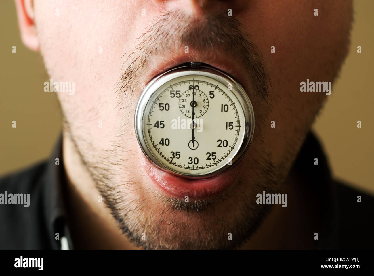Man with chronometer stopwatch in his mouth Stock Photo - Alamy