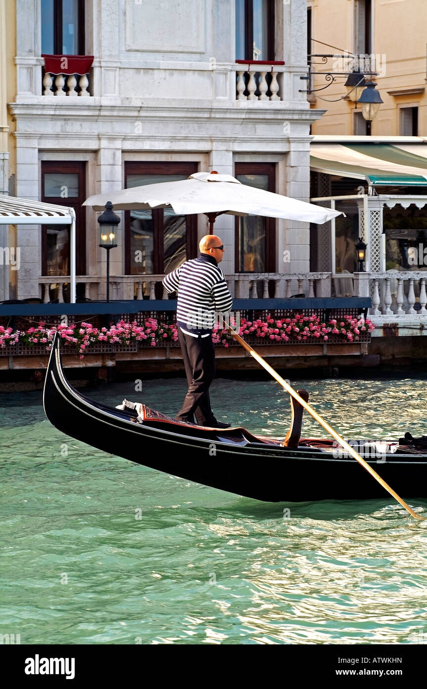 Gondolier in a gondola Stock Photo - Alamy